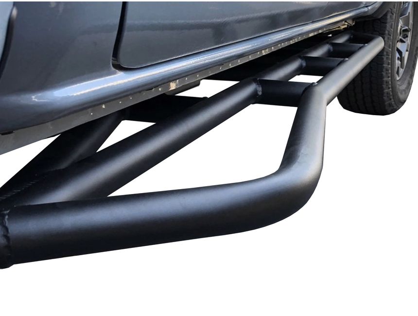 Cali Raised Step Edition Rock Sliders | RealTruck