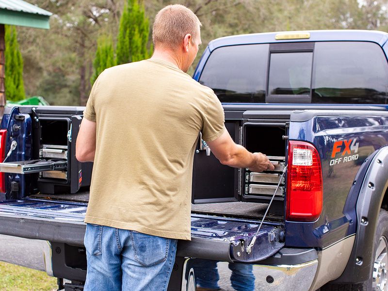 Taylor Wing Wheel Well Toolbox | RealTruck