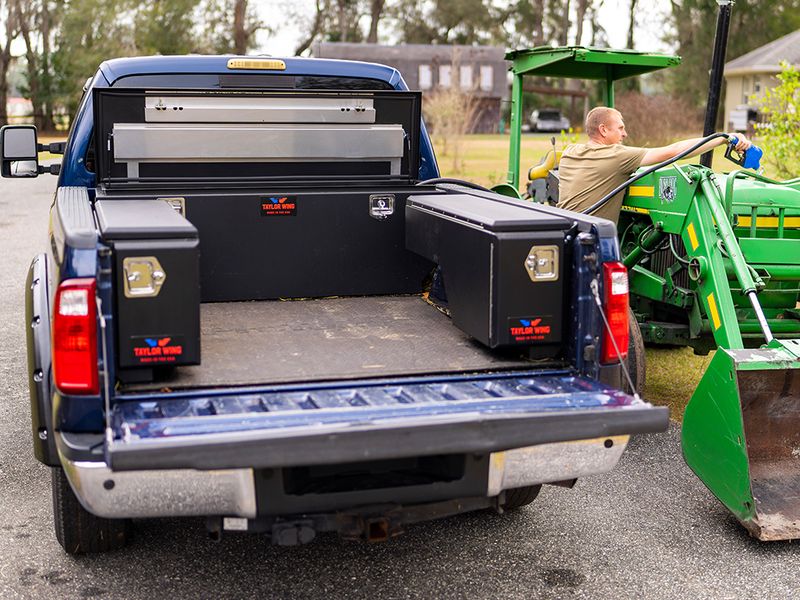 Taylor Wing Wheel Well Toolbox | RealTruck